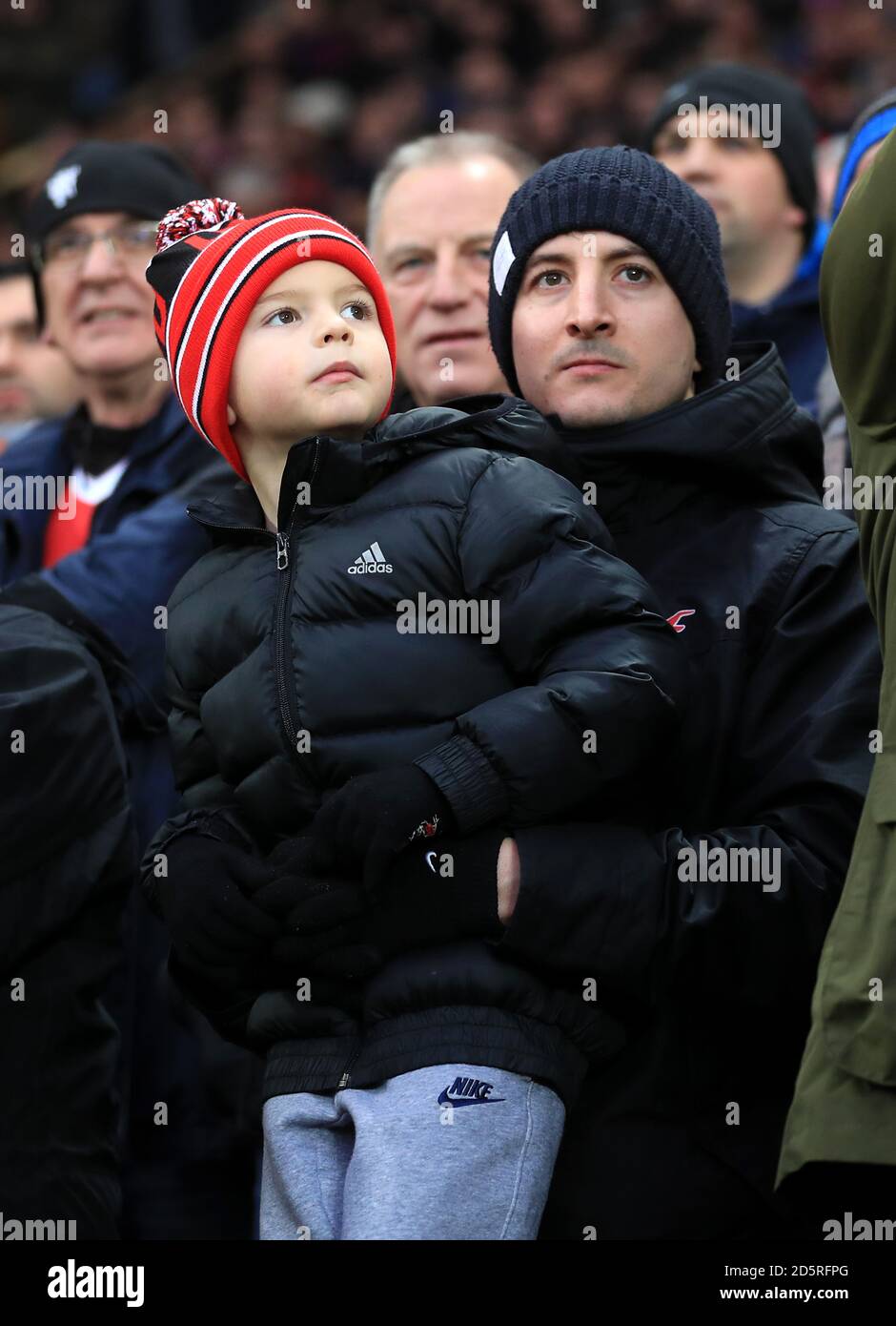 Manchester United fans in the stands Stock Photo - Alamy