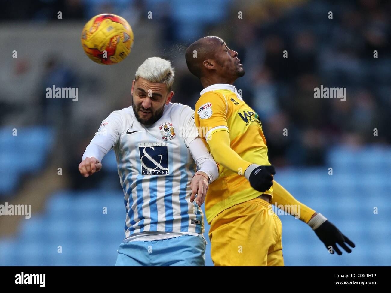 Coventry City's Valdimir Gadzhev and Millwall's Jimmy Abdou battle for ...