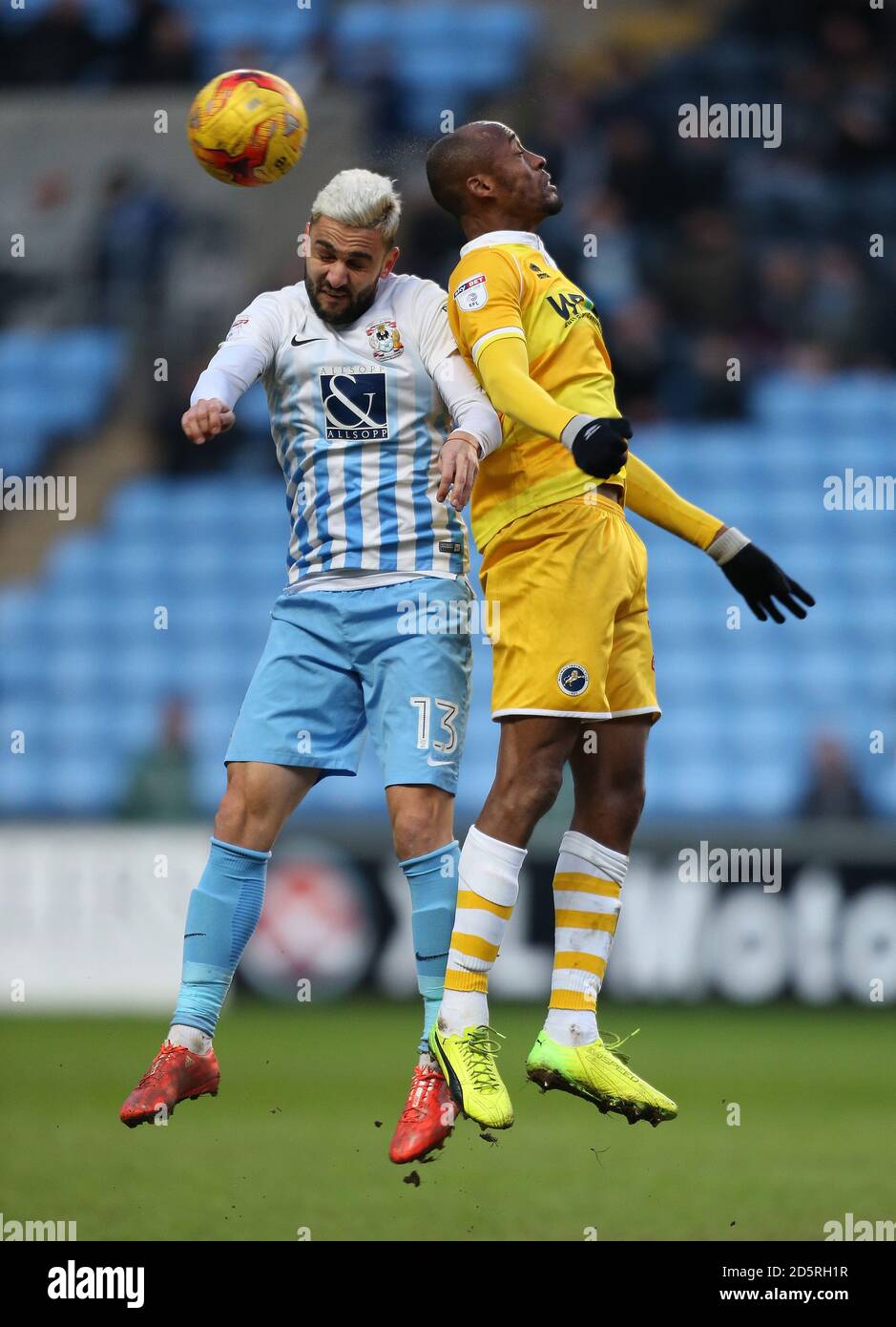 Coventry City's Valdimir Gadzhev and Millwall's Jimmy Abdou battle for ...