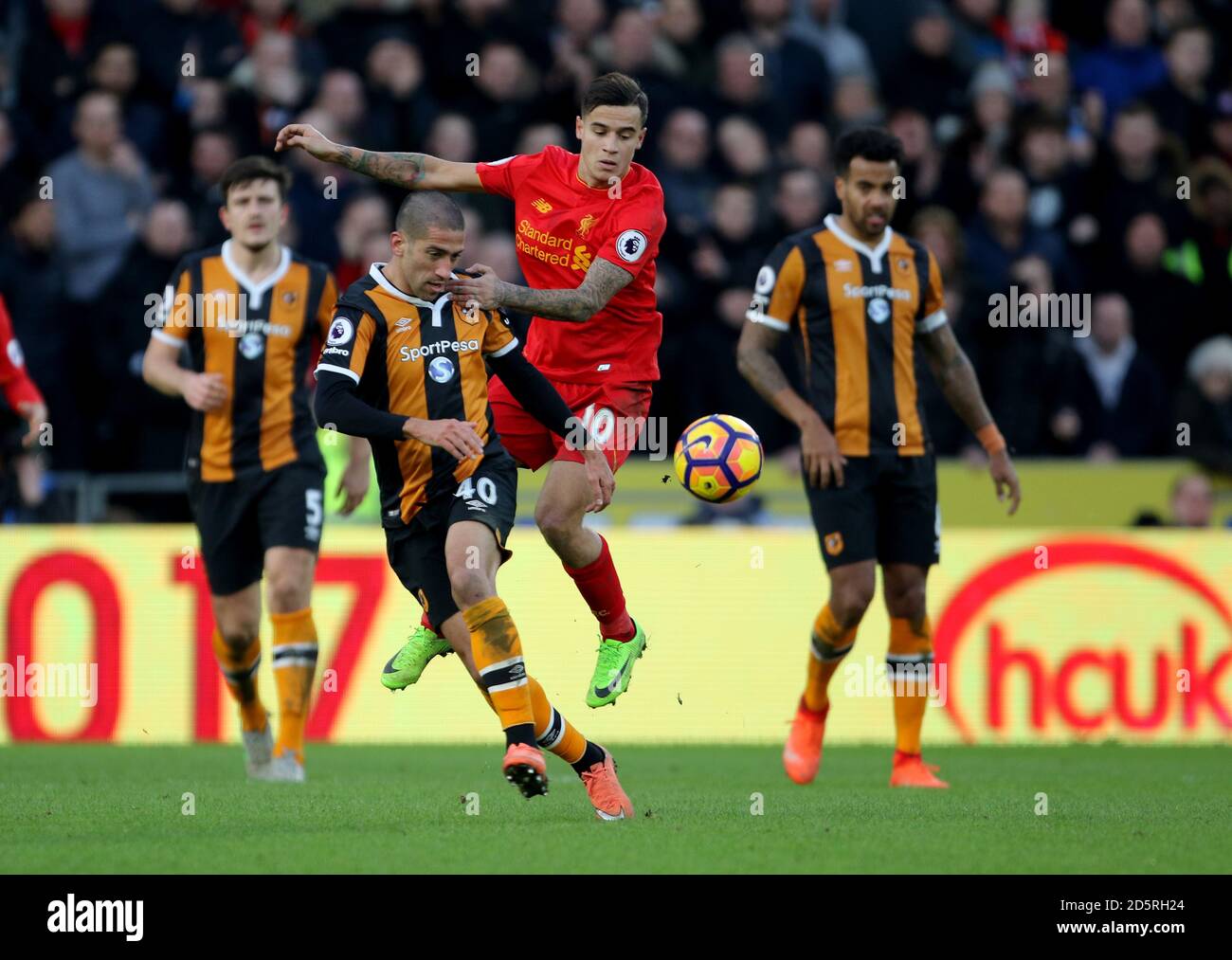 Hull City's Evandro Goebel and Liverpool's Philippe Coutinho challenge ...