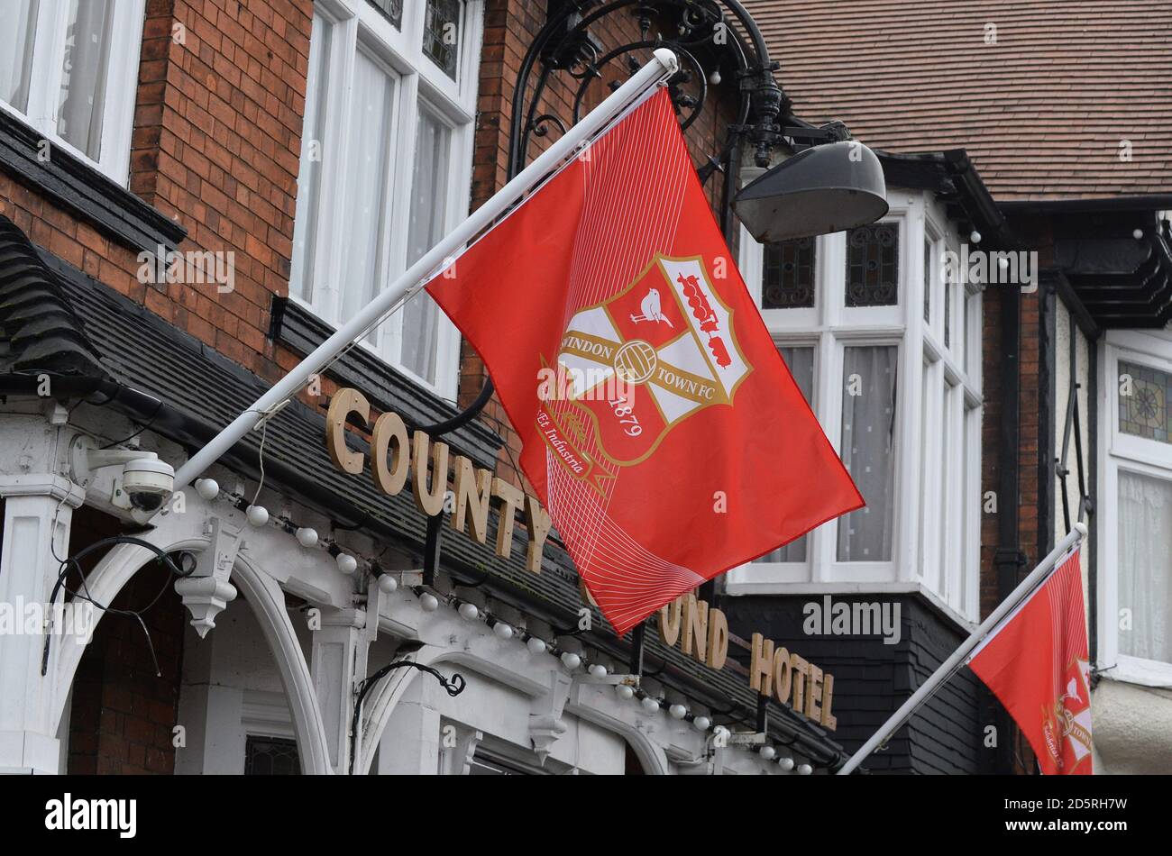 Swindon Town flags outside a local pub Stock Photo - Alamy