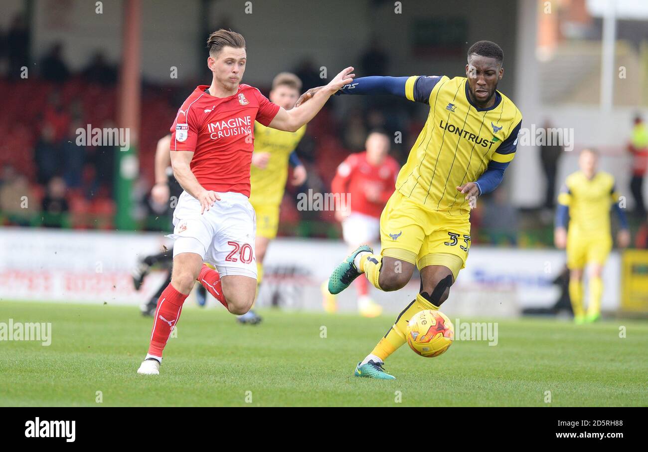Swindon Town's Charlie Colkett and Oxford United's Cheyenne Dunkley ...