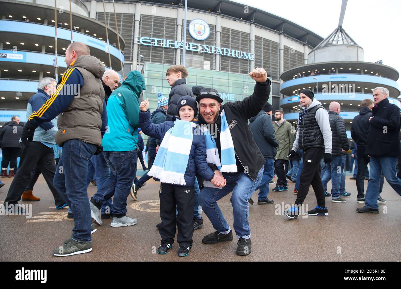 Manchester City fan Joshua Cullen, aged 7 (left) and Mark Edwards from ...