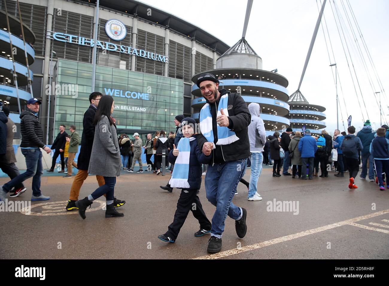 Manchester City fan Joshua Cullen, aged 7 (left) and Mark Edwards from ...