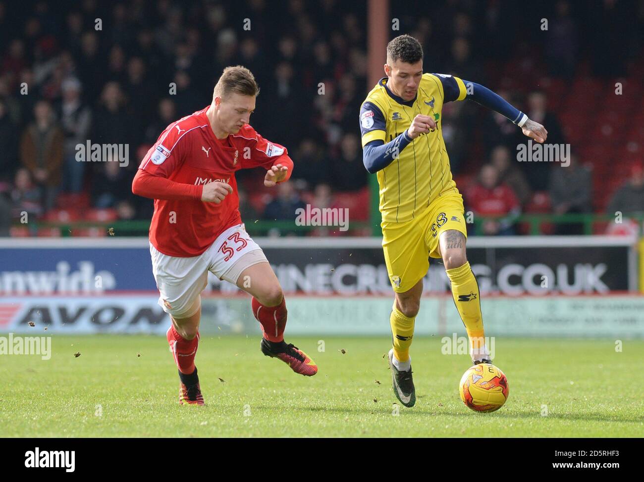 Swindon Town's Luke Norris (left) and Oxford United's Marvin Johnson in ...