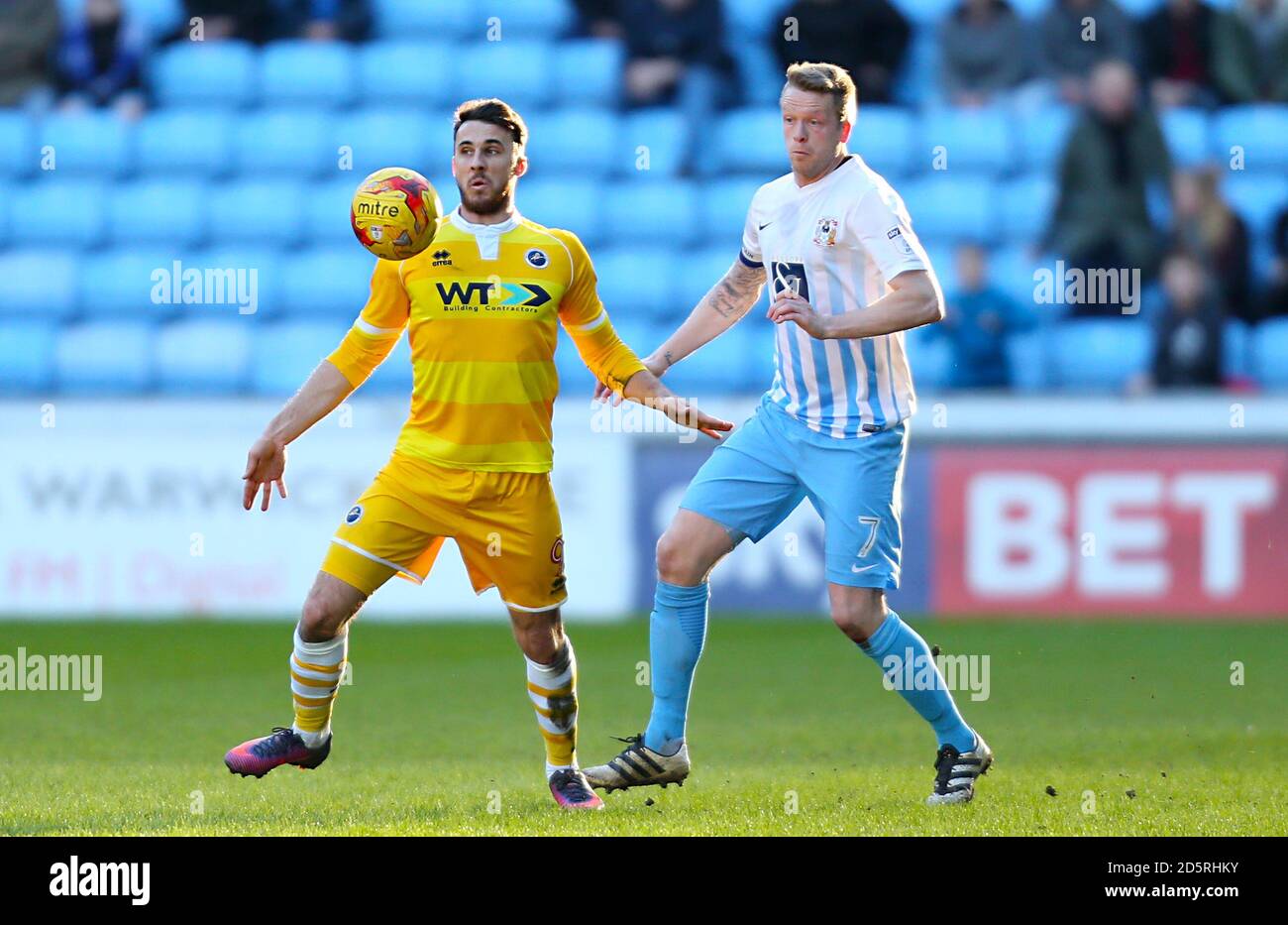 Millwall's Lee Gregory (left) and Coventry City's David Worrall battle ...