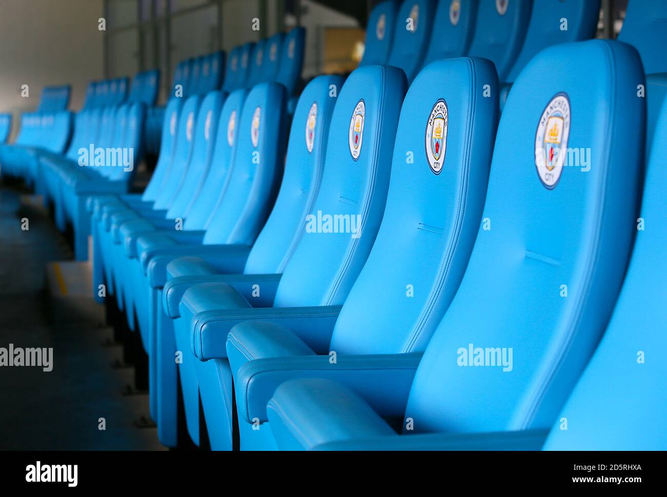 Manchester City branded seating Stock Photo - Alamy