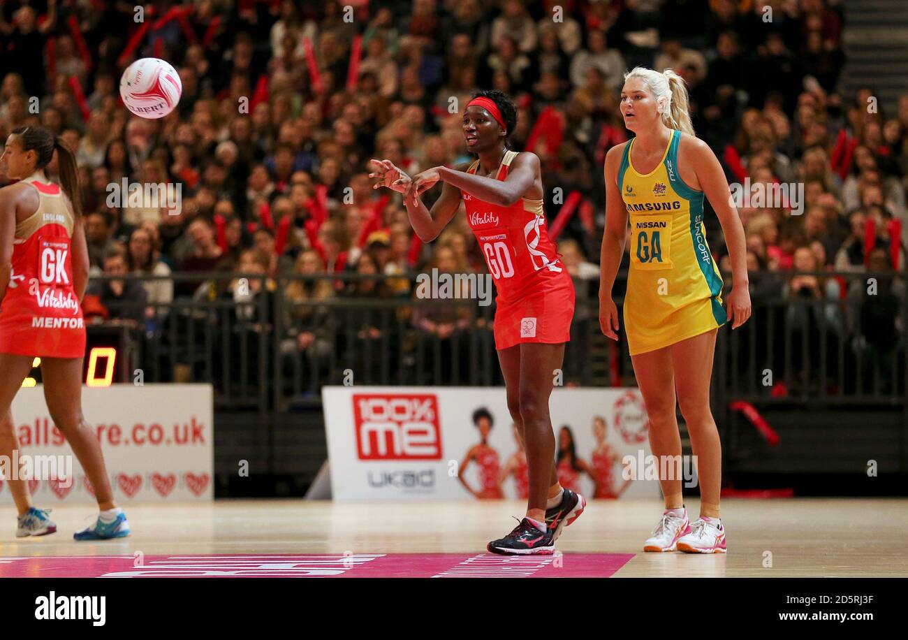 England's Ama Agbeze (left) in action with Australia's Gretel Tippett ...