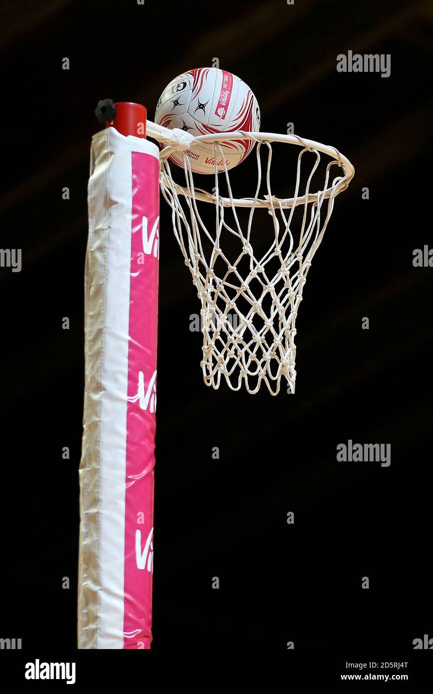 A general view of of a Netball dropping into a net Stock Photo - Alamy