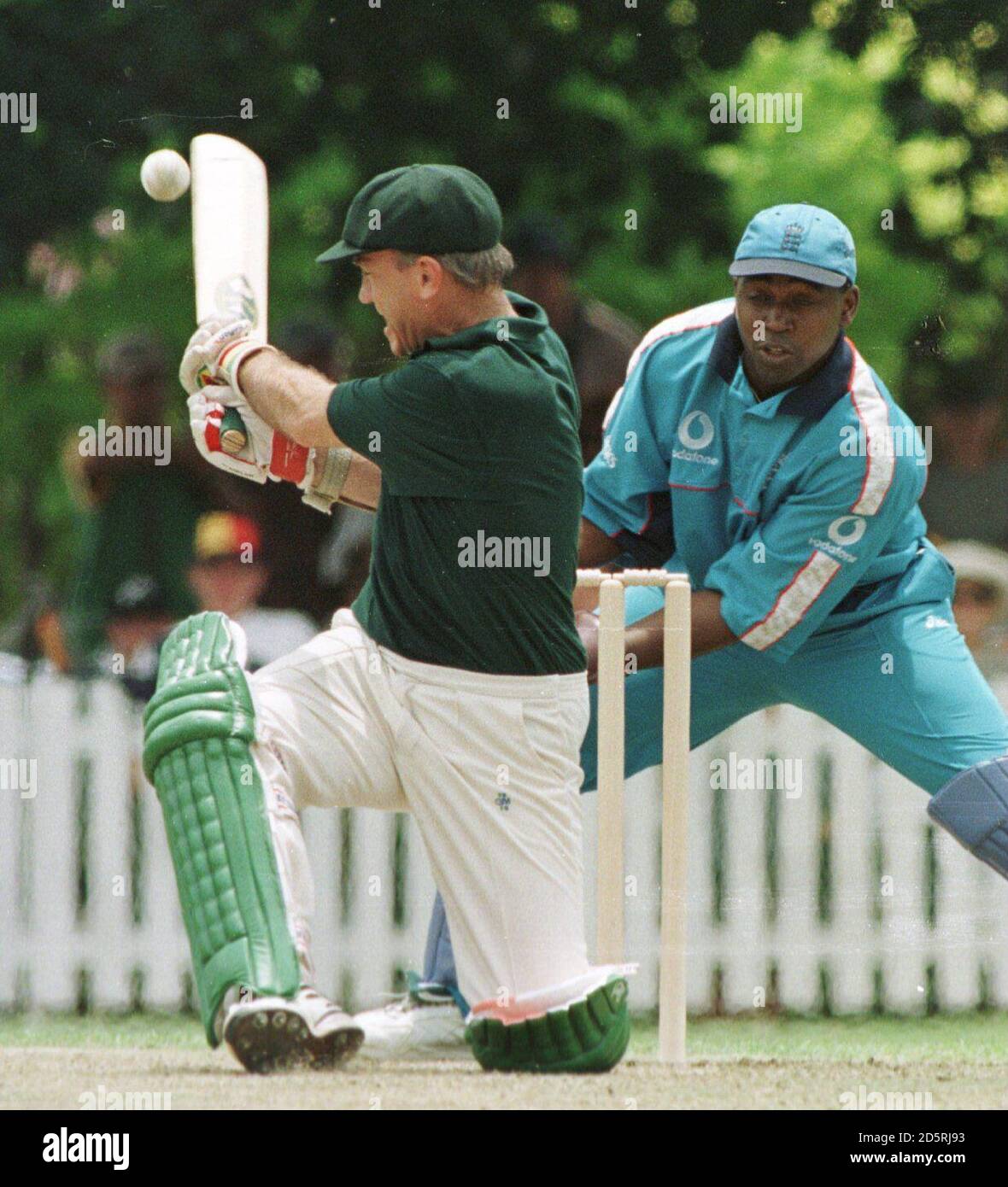 Bradman XI's Greg Matthews hooks the ball infront of England keeper ...