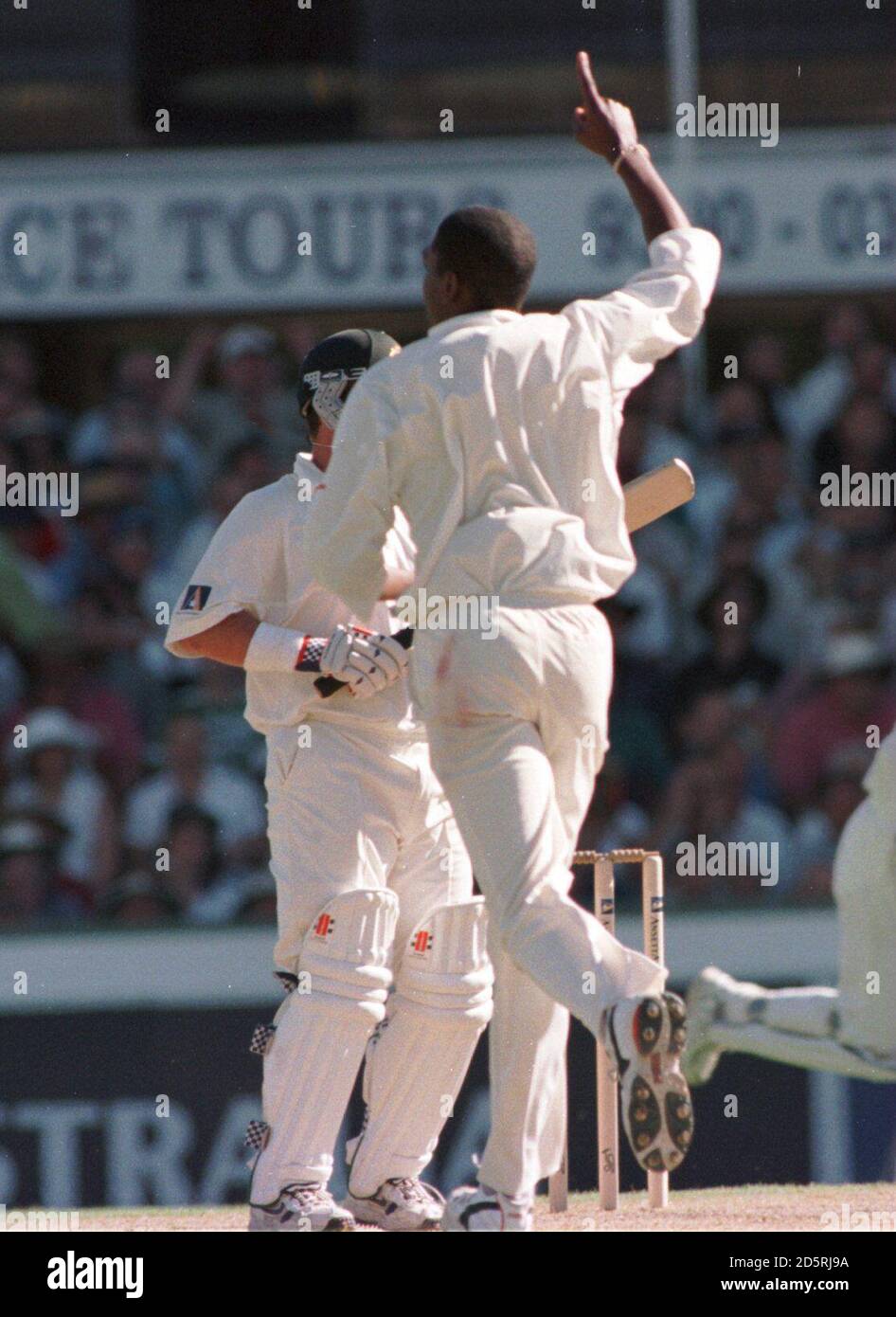 England's Alex Tudor signals the dismissal of Australia's Darren ...