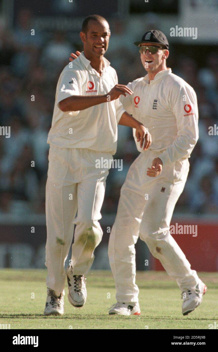 England's John Crawley congratulates Dean headley on dismissing ...