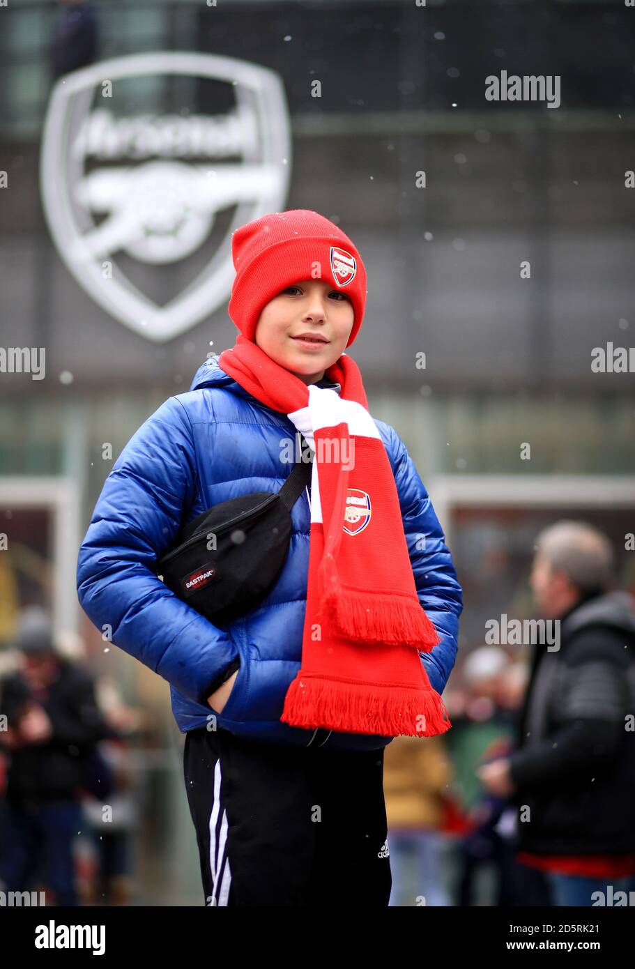 A young Arsenal fan outside the ground Stock Photo - Alamy