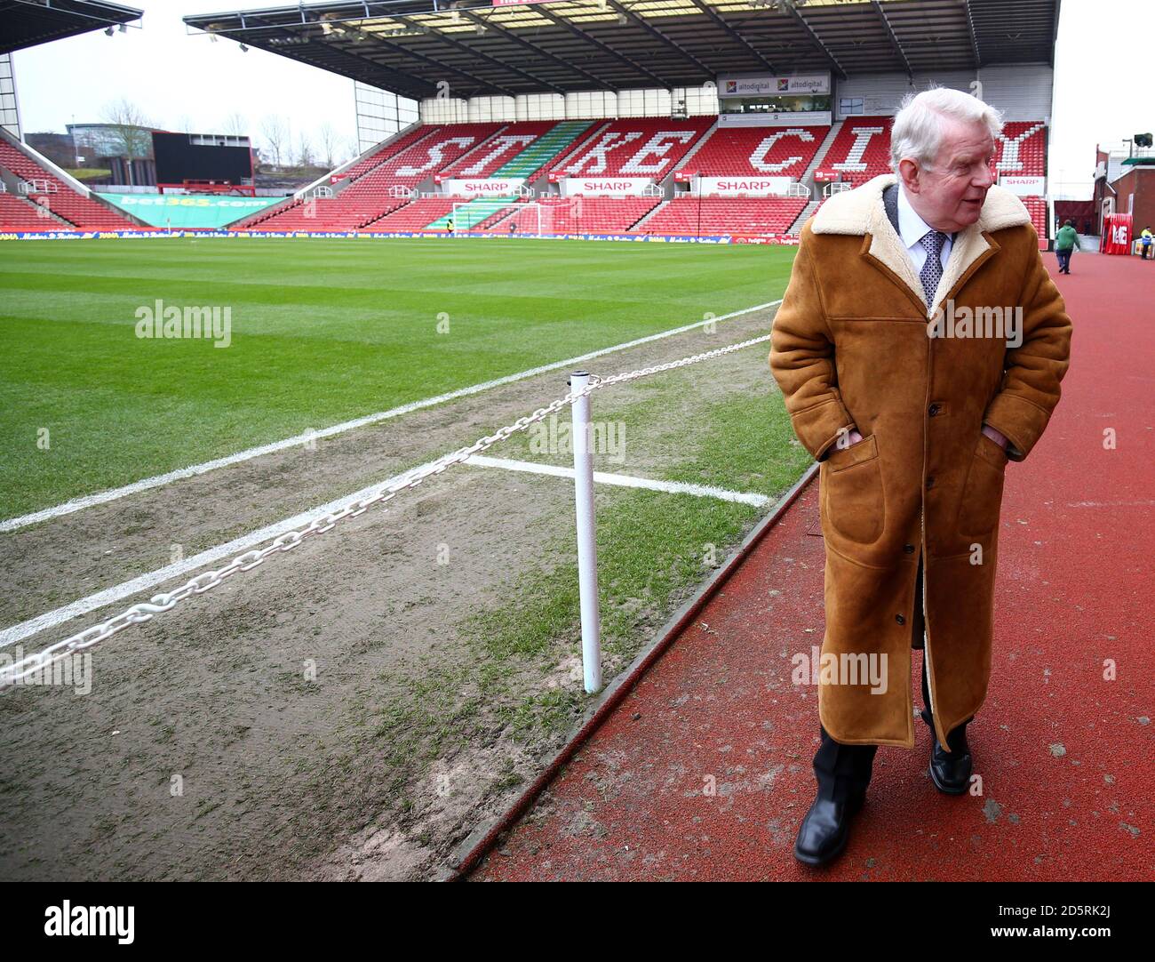 TV commentator John Motson arrives in his trademark Sheepskin jacket ...