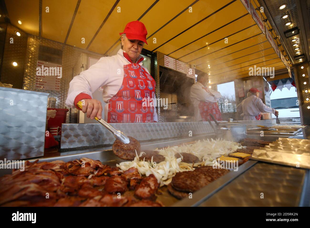 Burger bar staff prepare for the fans arrival Stock Photo - Alamy