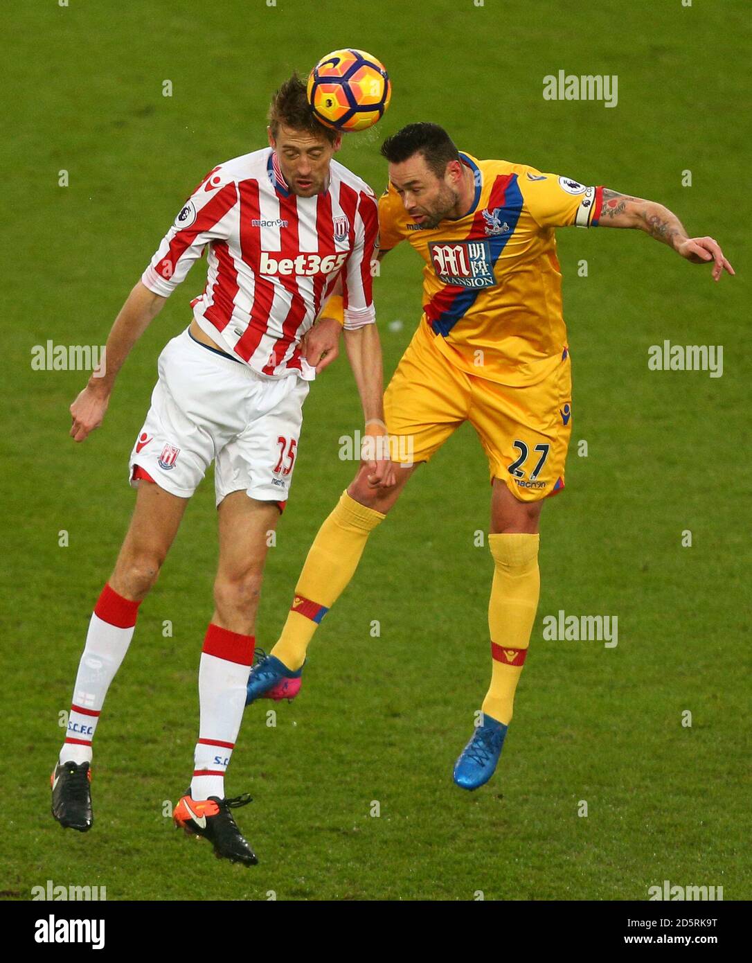 Stoke City's Peter Crouch (left) and Crystal Palace's Damien Delaney ...