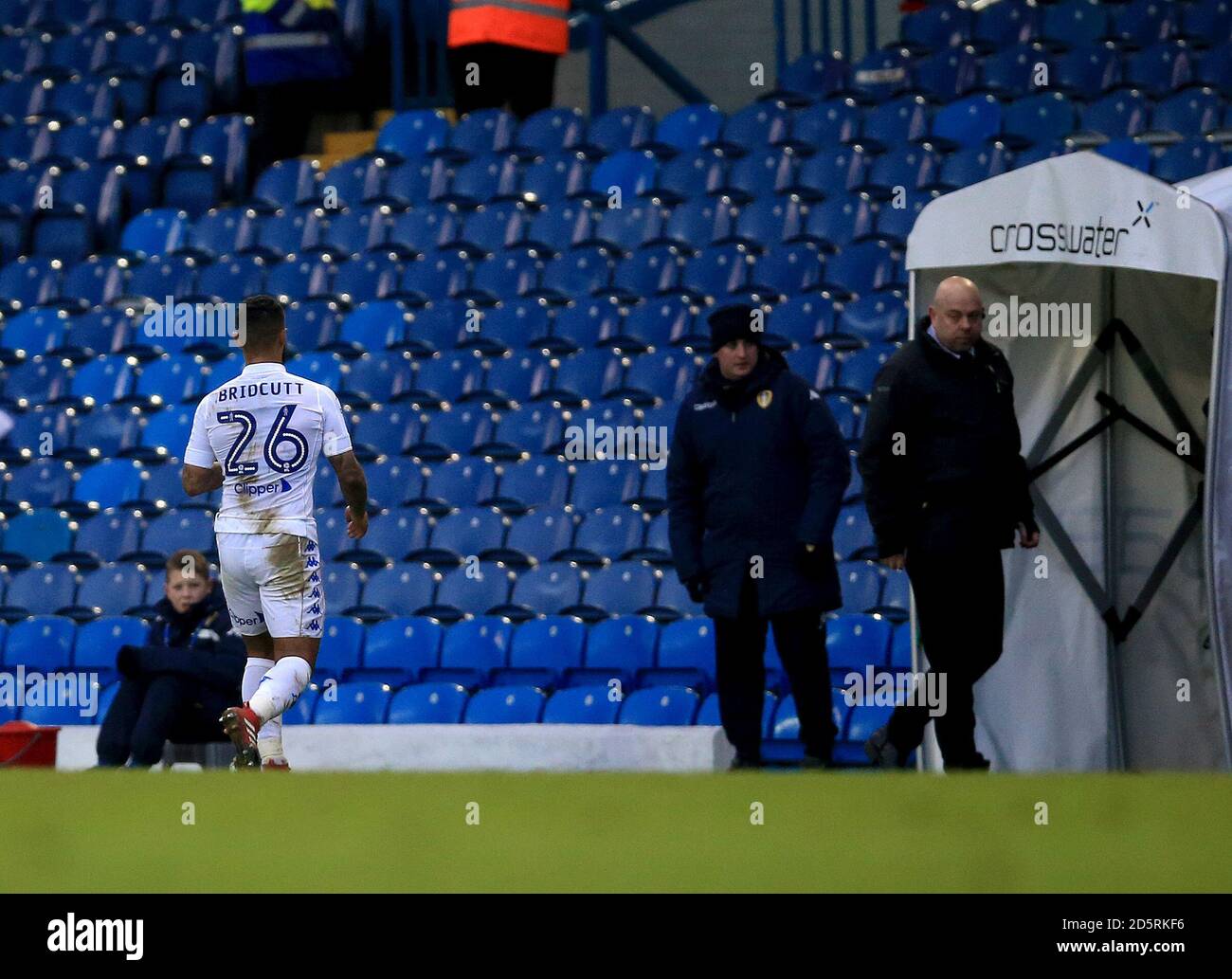 Leeds United's Liam Bridcutt (Left) leaves the field after being shown ...