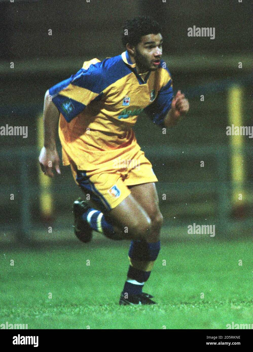 Iyseden Christie of Mansfield Town celebrates scoring their third goal ...