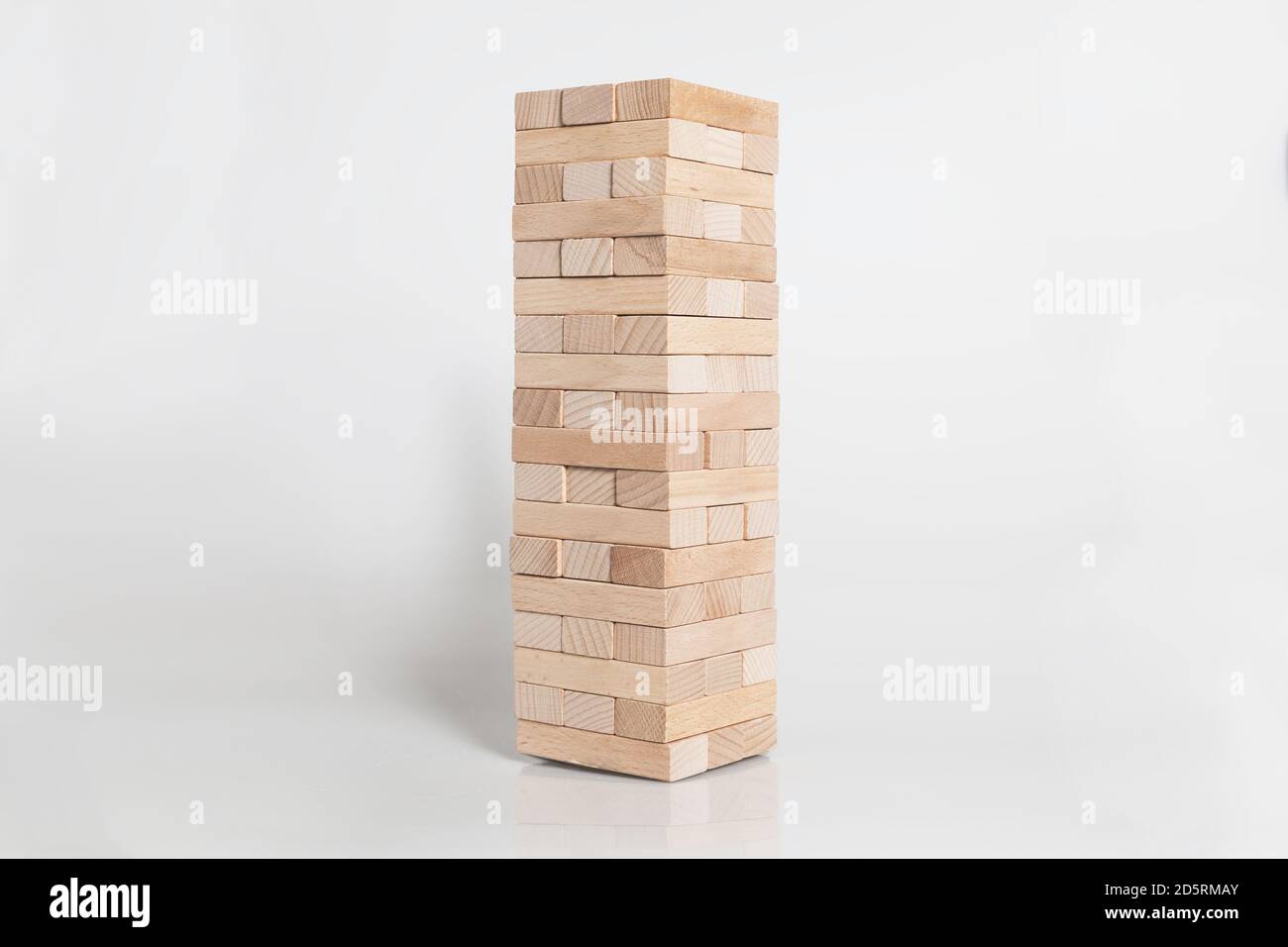 Stack of a wooden block tower isolated on a white background Stock ...