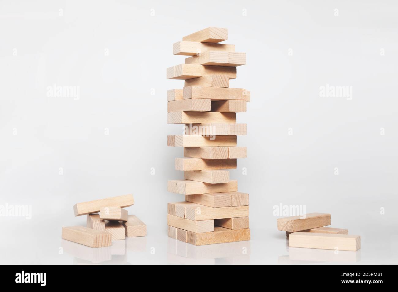Stack of a wooden block tower isolated on a white background Stock ...
