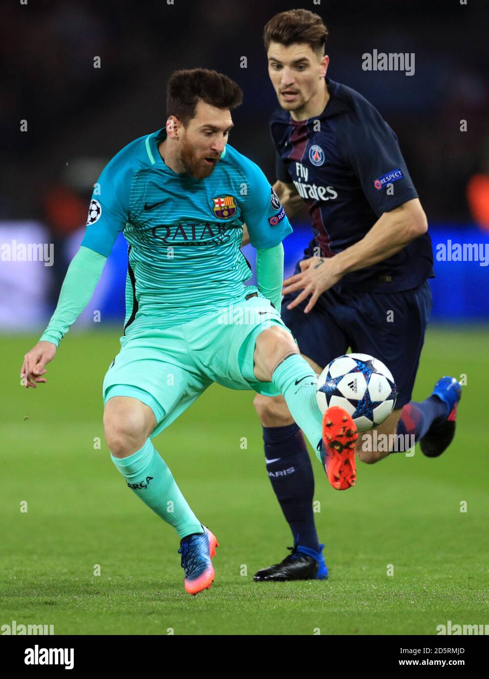 Paris Saint-Germain's Thomas Meunier and Barcelona's Lionel Messi ...