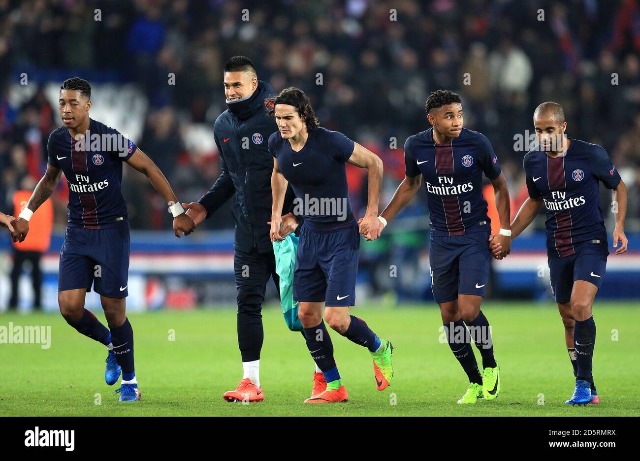 Paris Saint-Germain's Edinson Cavani (centre) leads his teams ...