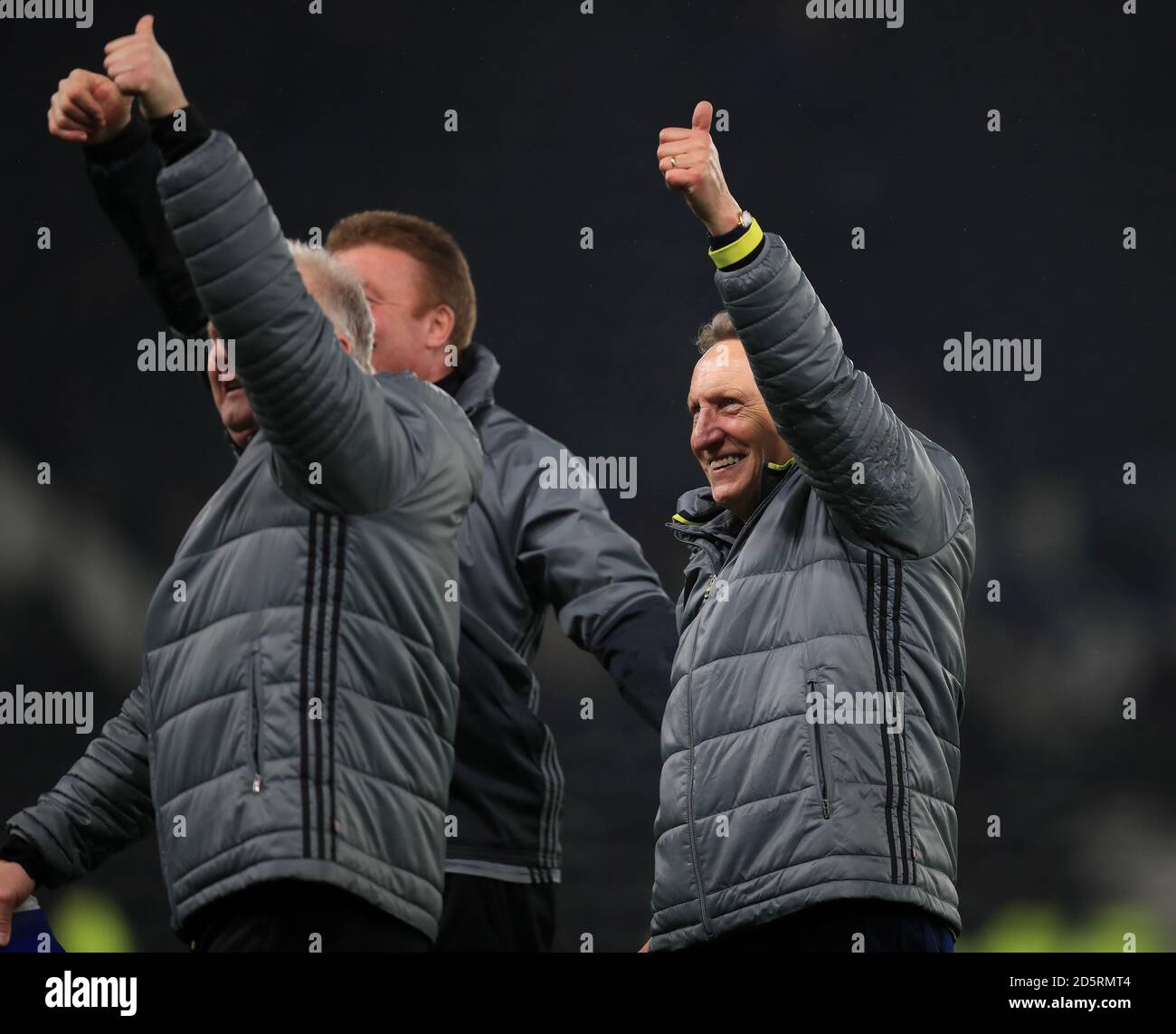 Cardiff City's Neil Warnock and his coaching staff give the thumbs up ...