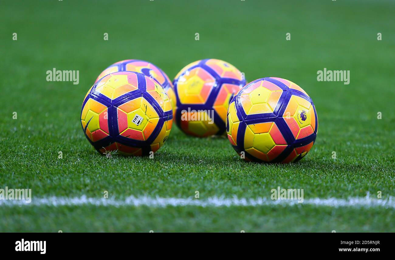 Mitre footballs on the pitch prior to the match Stock Photo - Alamy