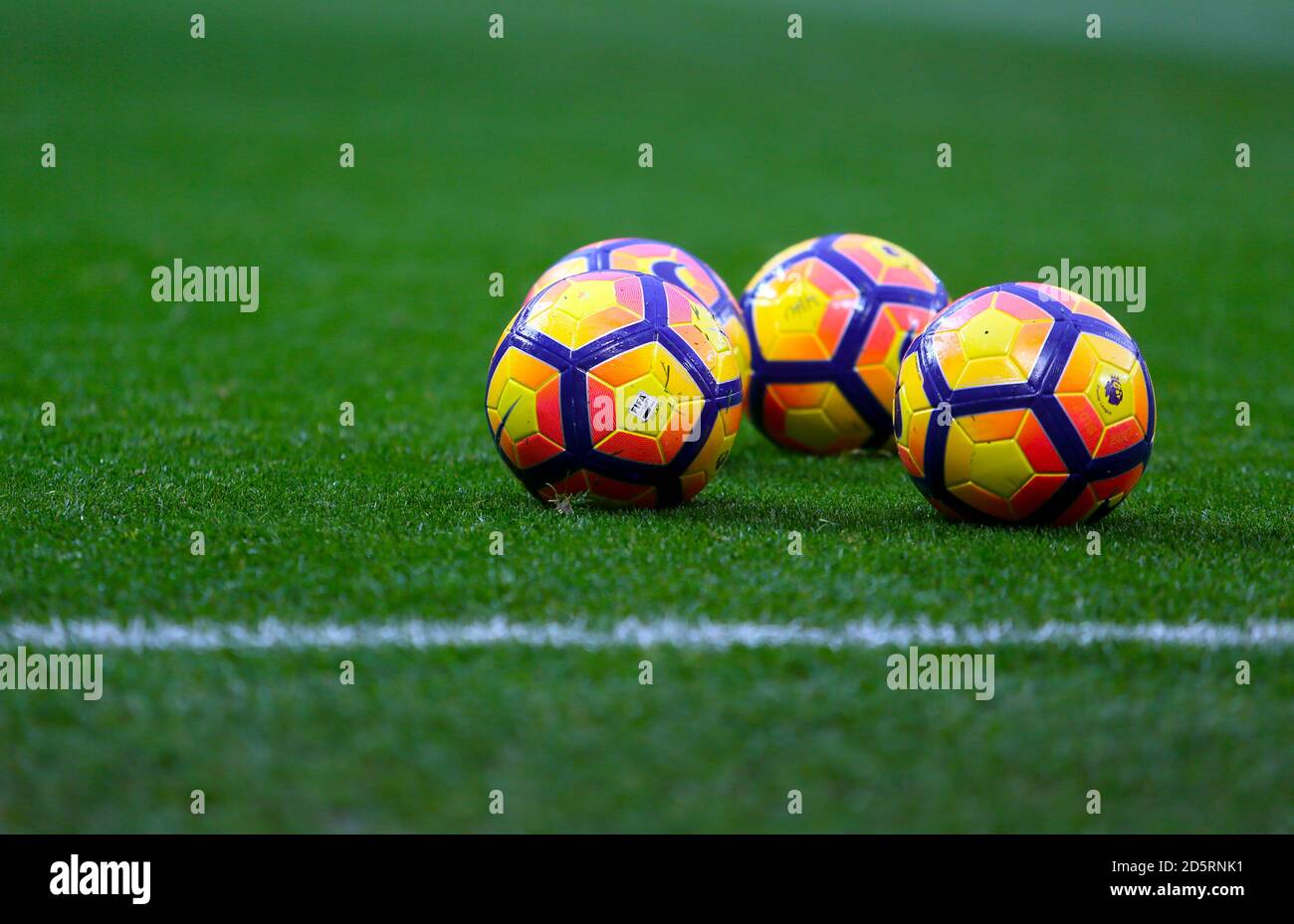 Mitre footballs on the pitch prior to the match Stock Photo - Alamy