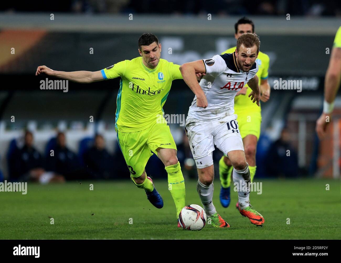 Gent's Stefan Mitrovic (left) and Tottenham Hotspur's Harry Kane (right ...