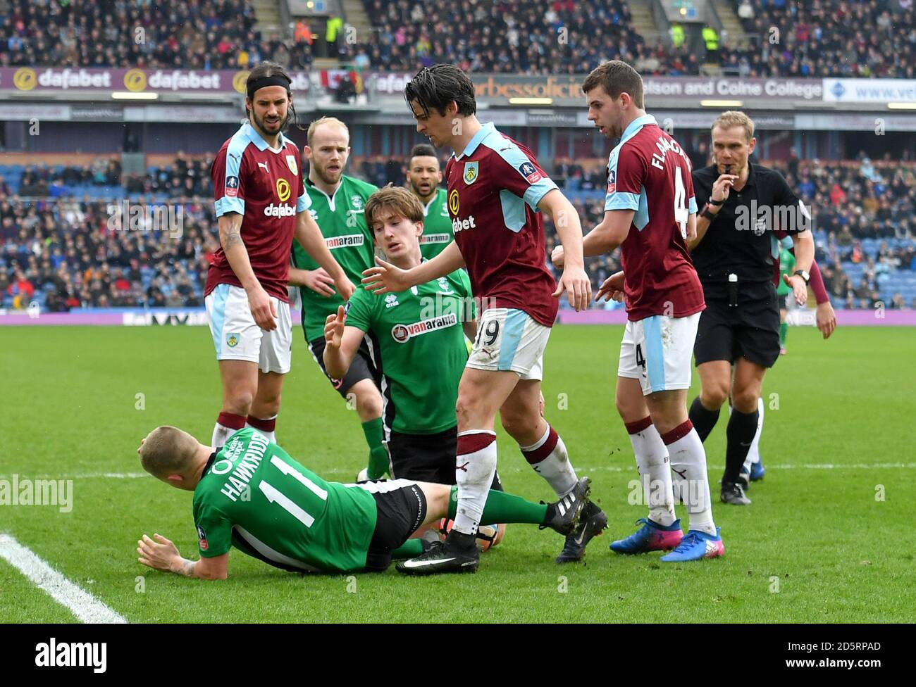 Burnley's Joey Barton (left) fouls Lincoln City's Terry Hawkridge Stock ...