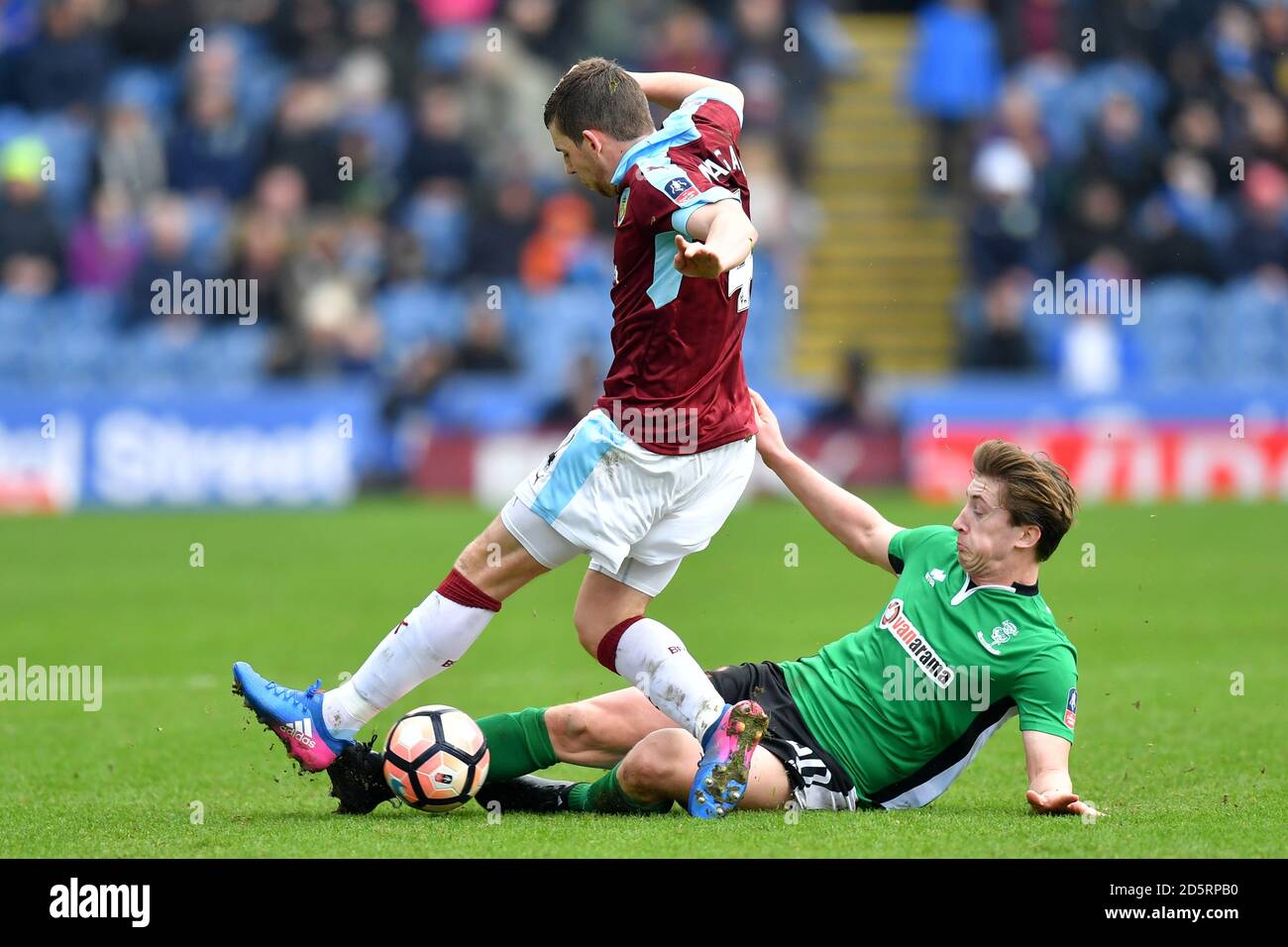 Lincoln City's Alex Woodyard tackles Burnley's Jon Flanagan Stock Photo ...