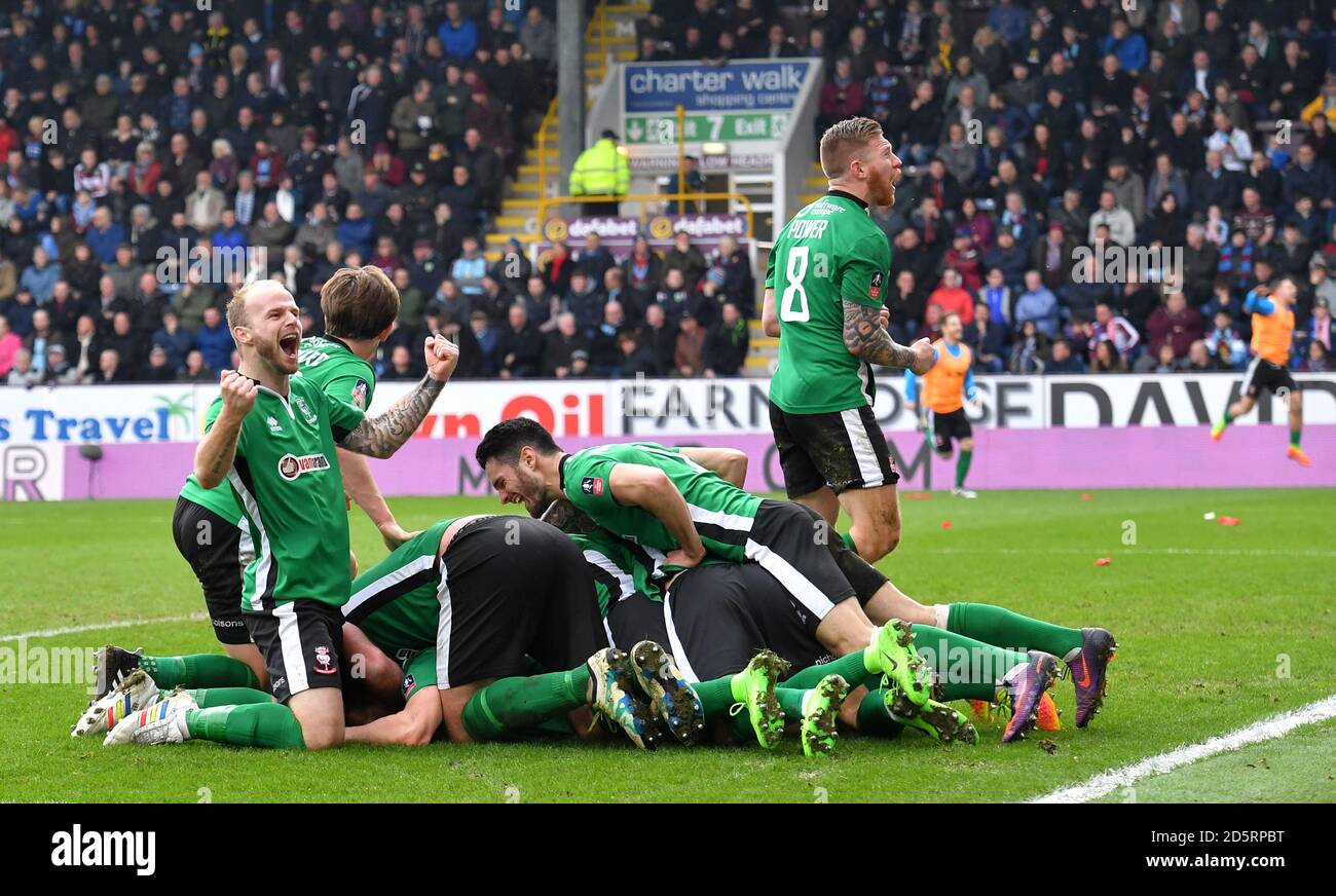 Lincoln City's Sean Raggett celebrates scoring his side's first goal of ...