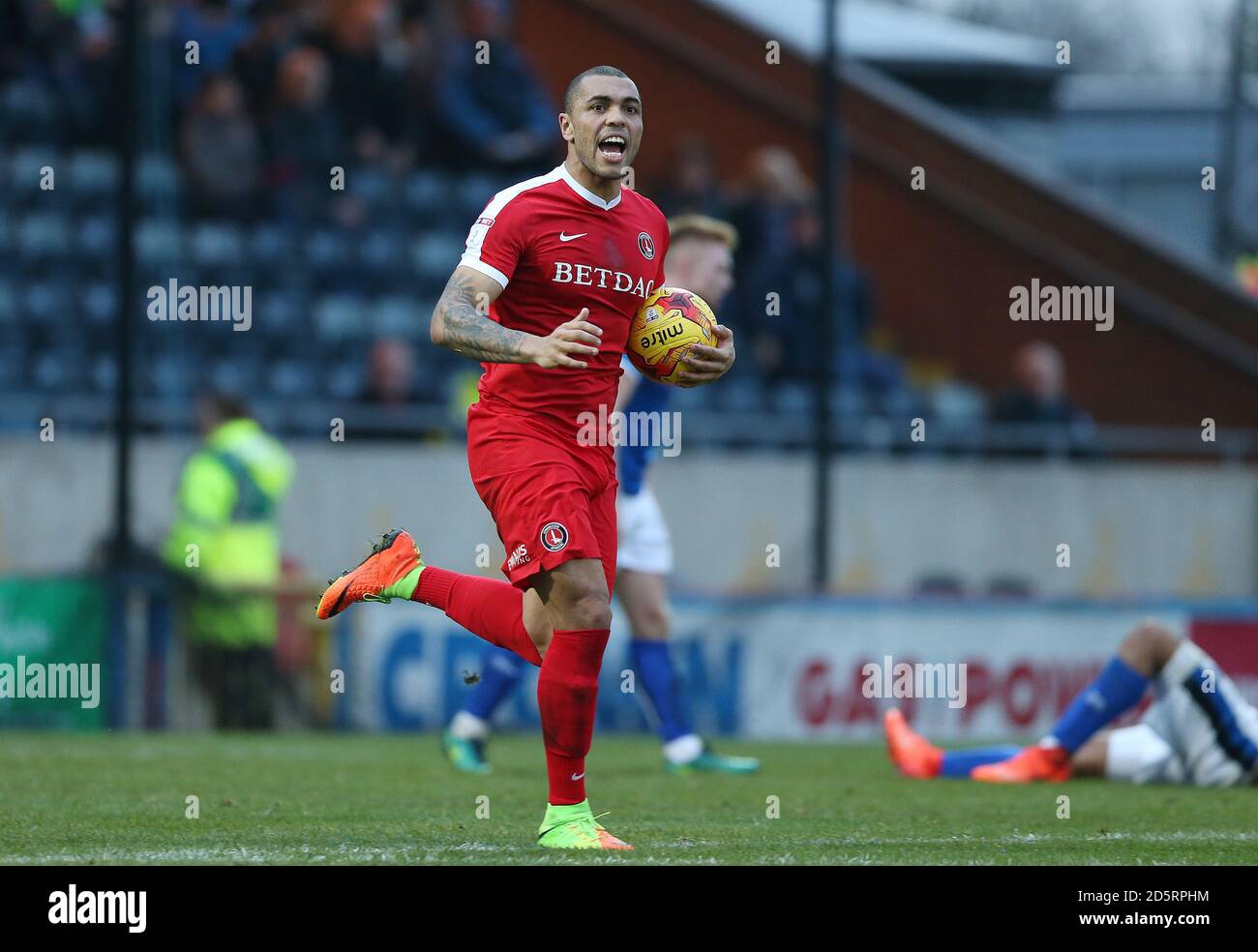 Charlton Athletic's Josh Magennis runs back with the ball after the 3rd ...