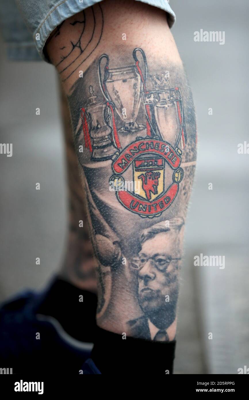 The tattoos of a Manchester United fan outside the ground before the ...