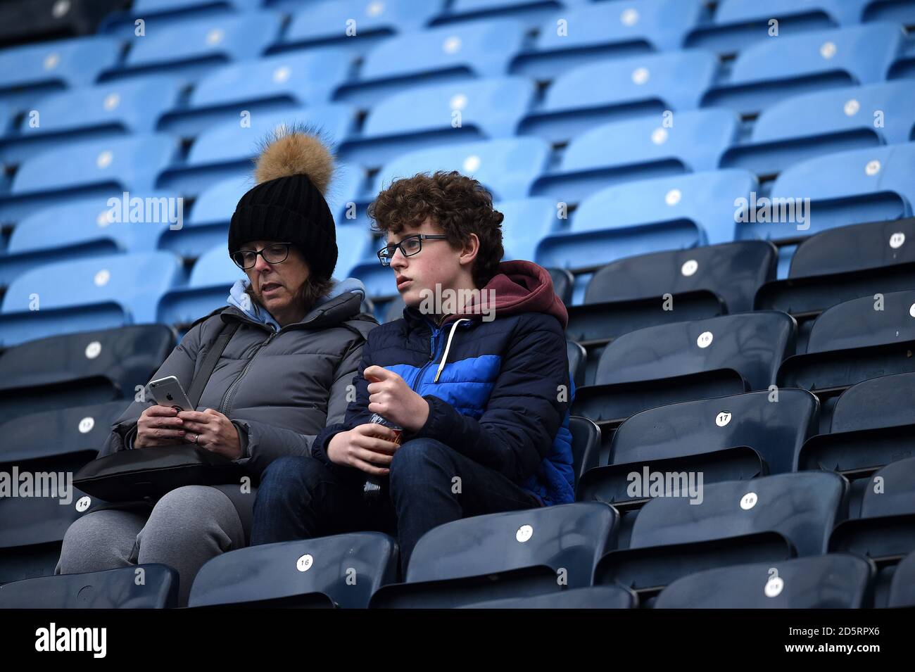 Fans in the stands Stock Photo - Alamy