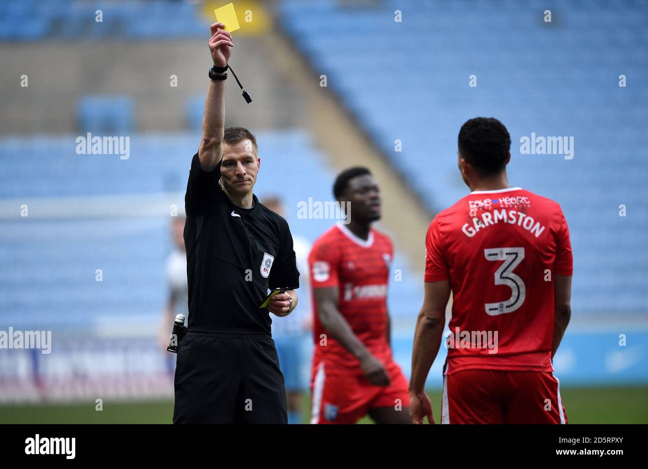 Match referee Michael Salisbury books Gillingham's Bradley Garmston ...