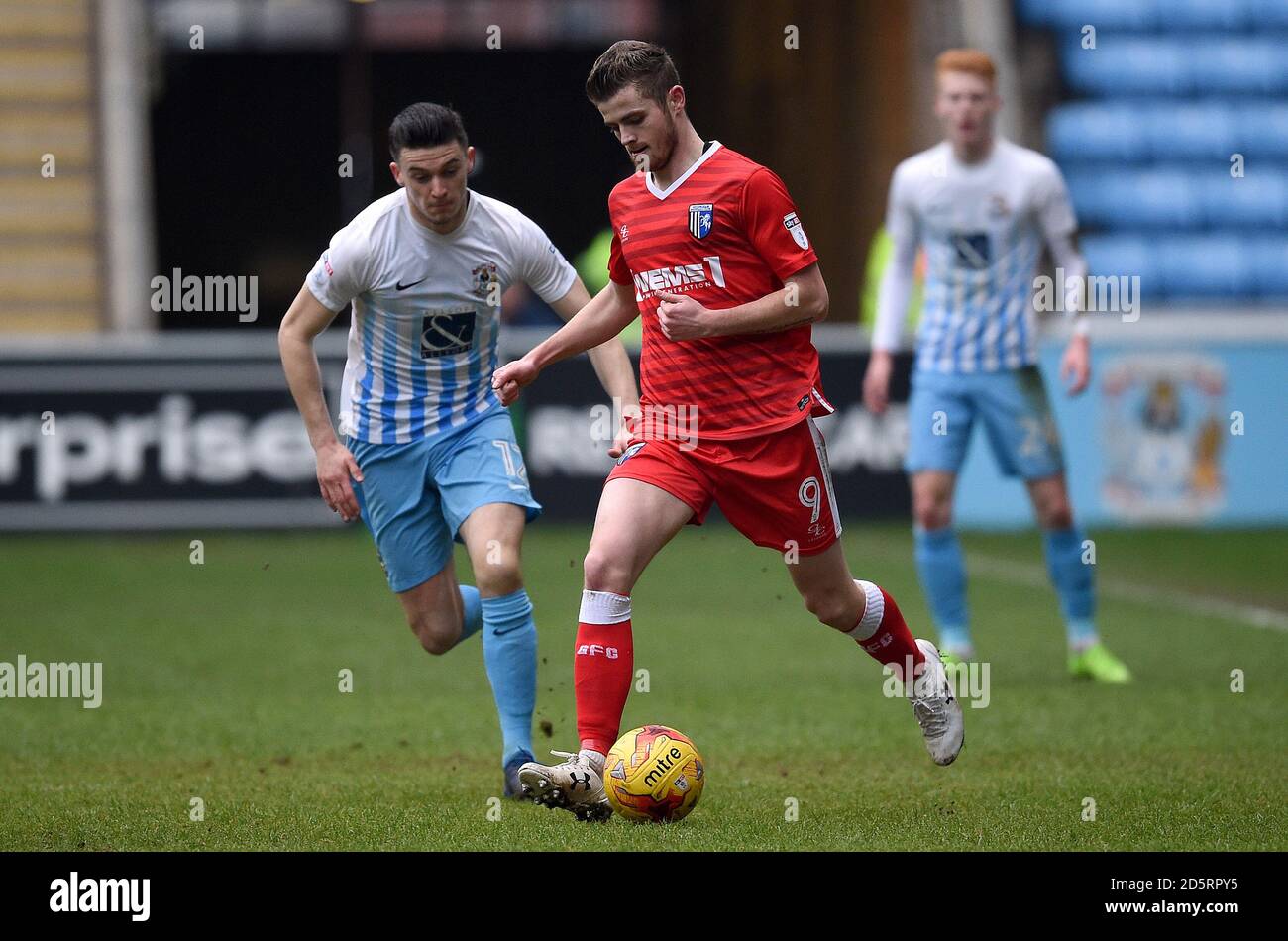 Coventry City's Callum Reilly (left) and Gillingham's Rory Donnelly ...