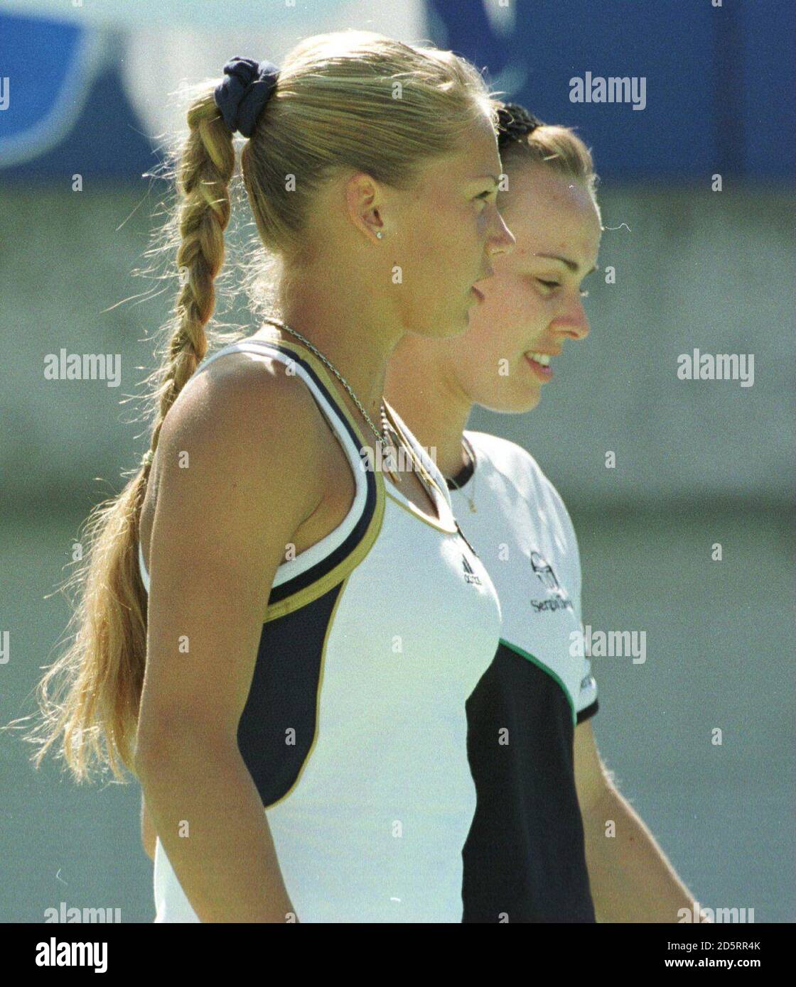 Russia's Anna Kournikova and Switzerland's Martini Hingis in their ...