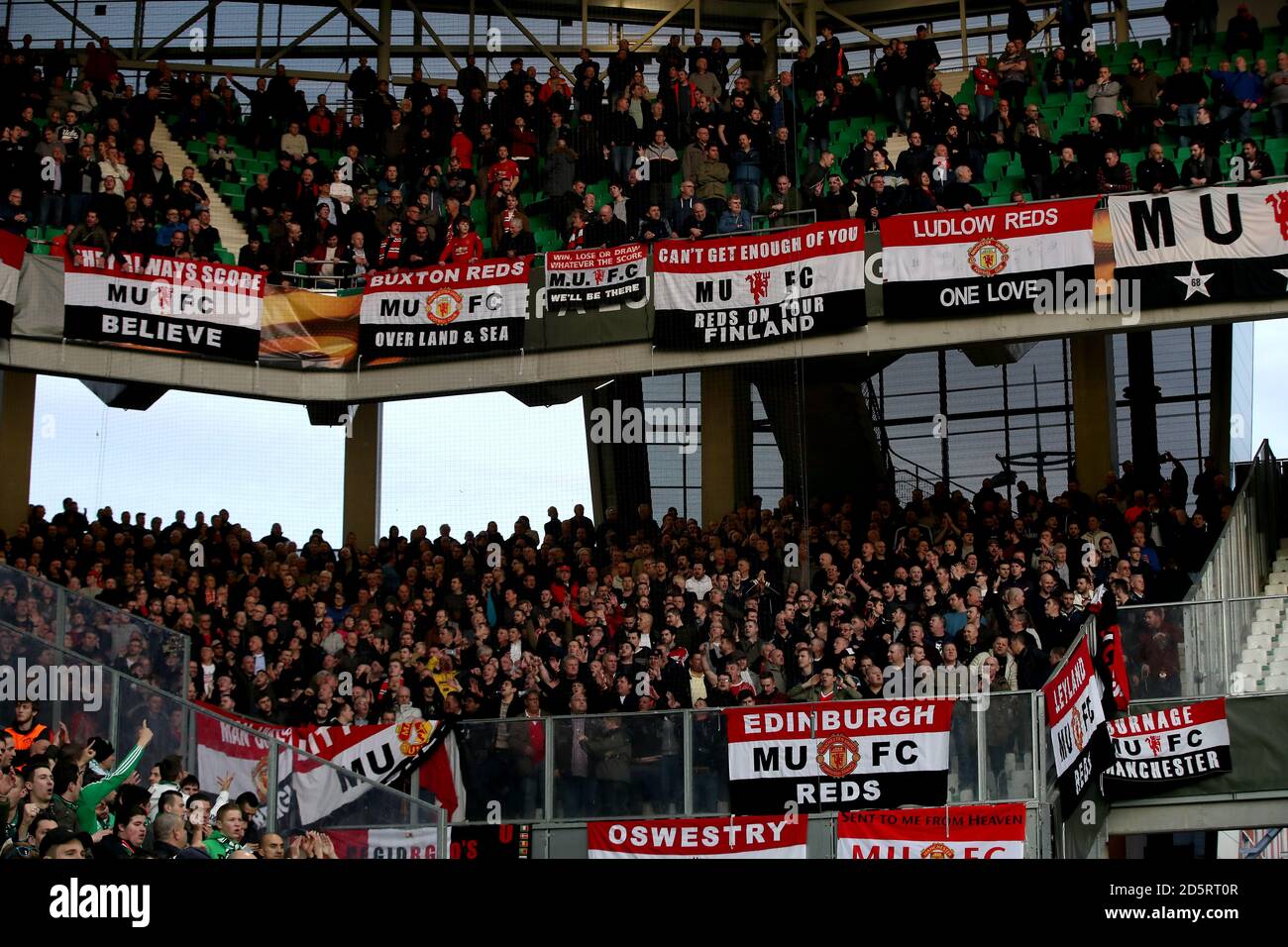 Manchester United fans in the stands Stock Photo - Alamy