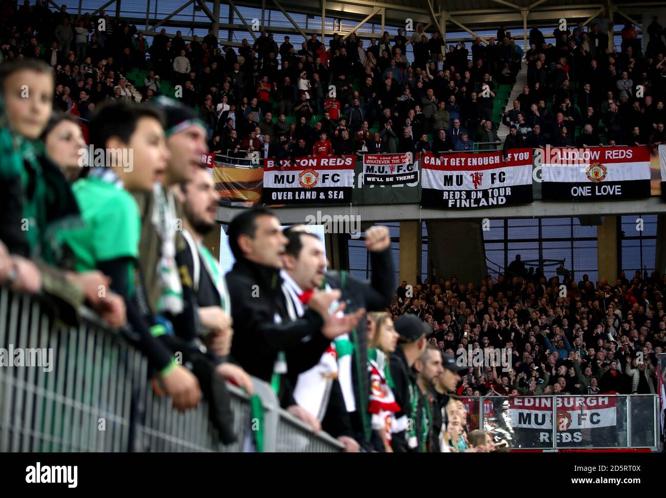 Manchester United fans show support for their team in the stands Stock ...