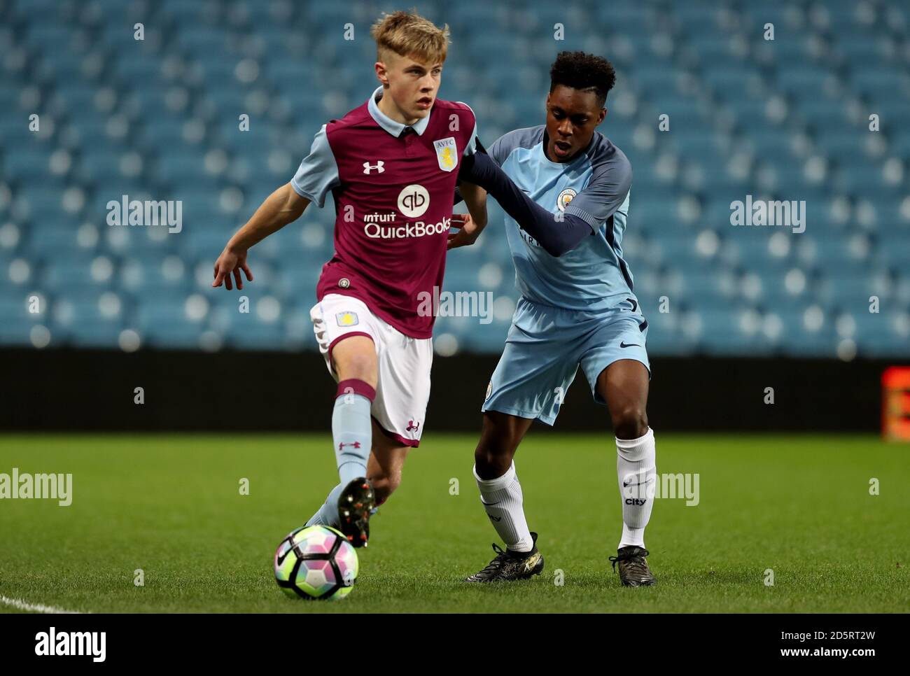 Aston Villa's Jordan Cox (left) and Manchester City's Jeremie Frimpong ...