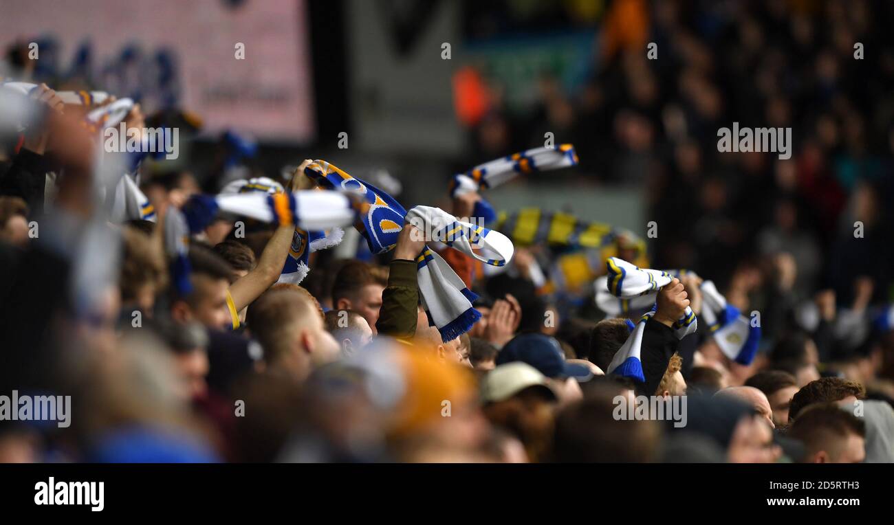 Leeds fans wave their scarves to celebrate their team's victory Stock ...
