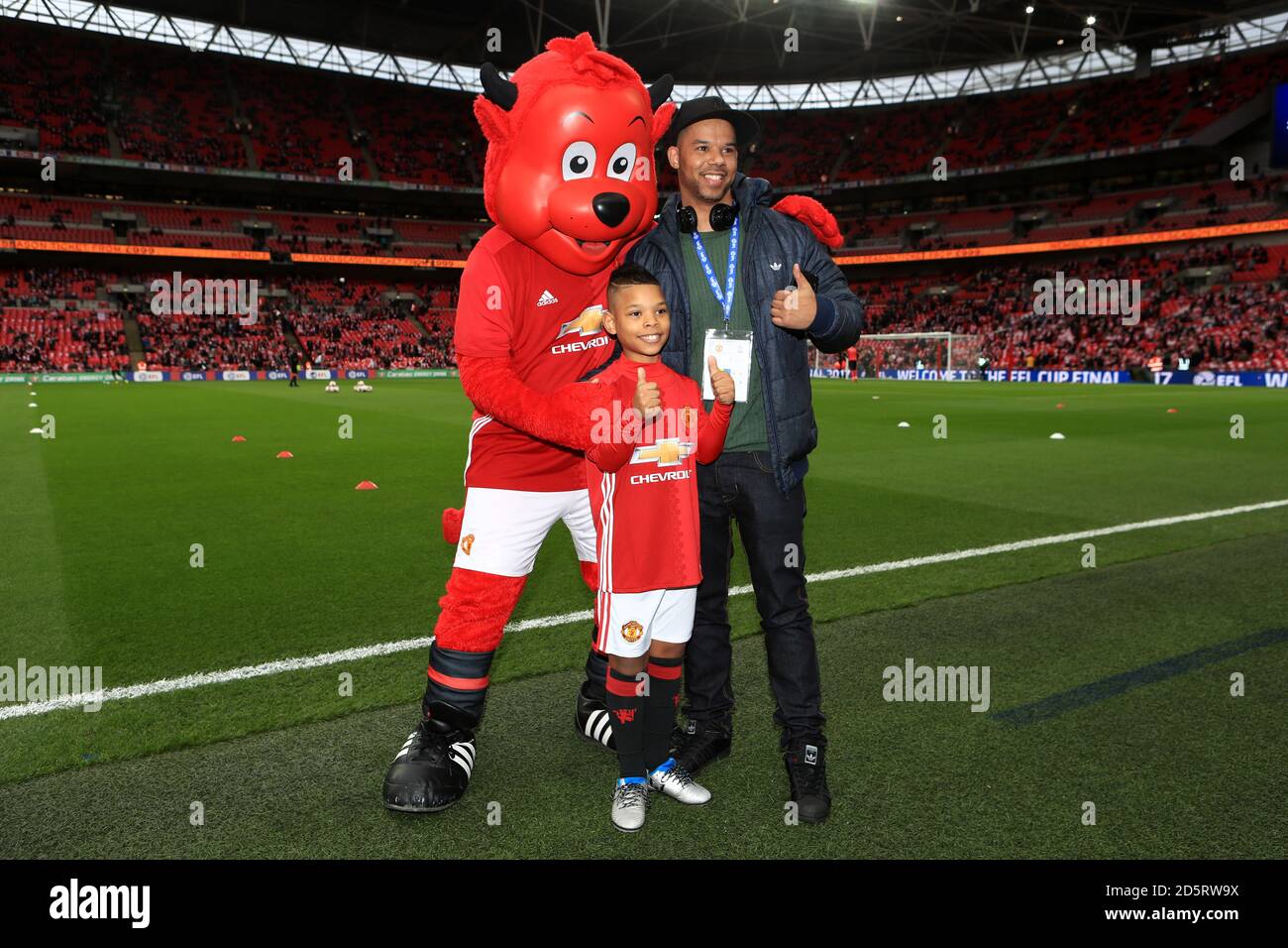 Manchester United club mascot Fred the Red (left) and Manchester United ...