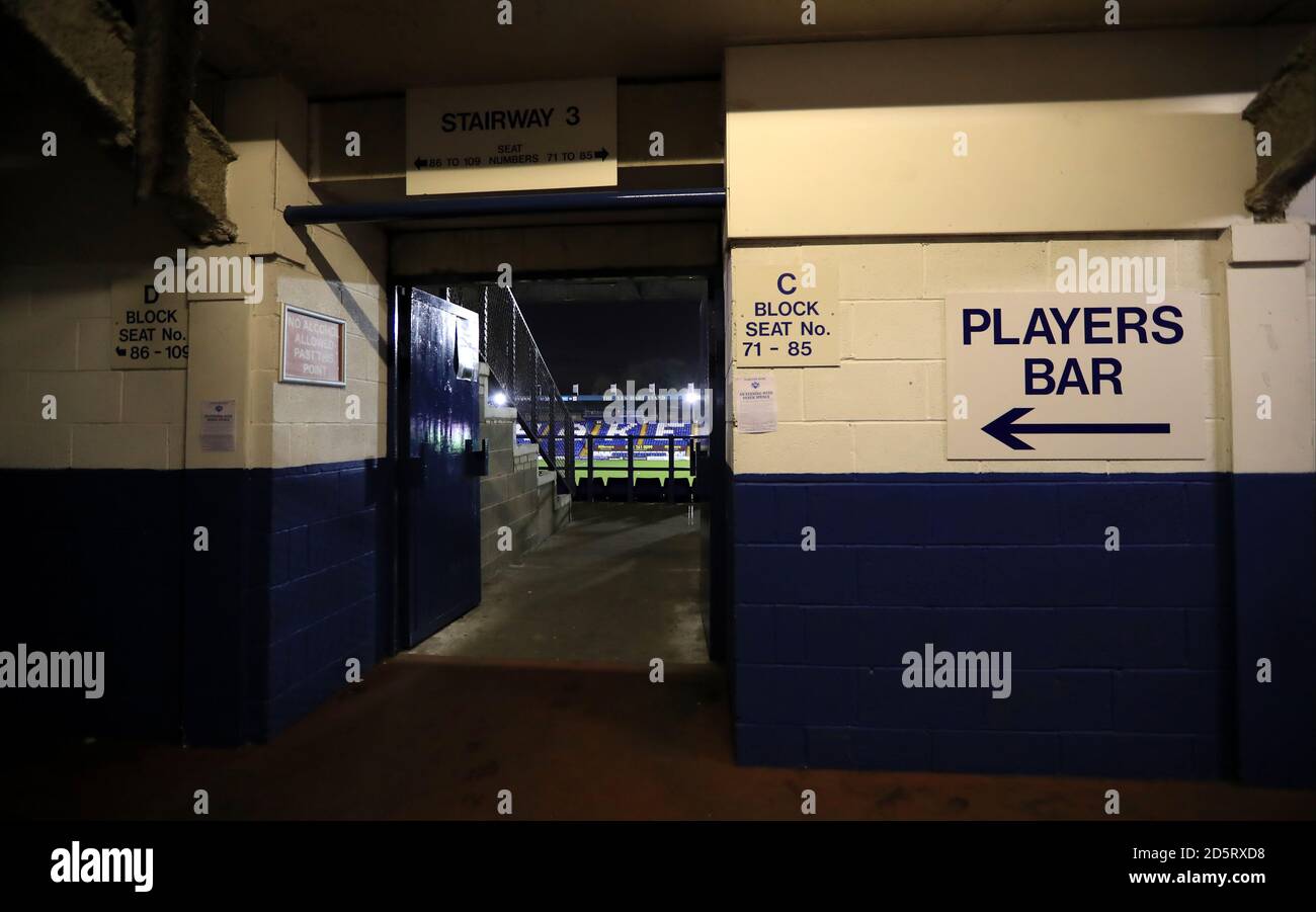A view from the concourse towards the pitch at Gigg Lane Stock Photo ...