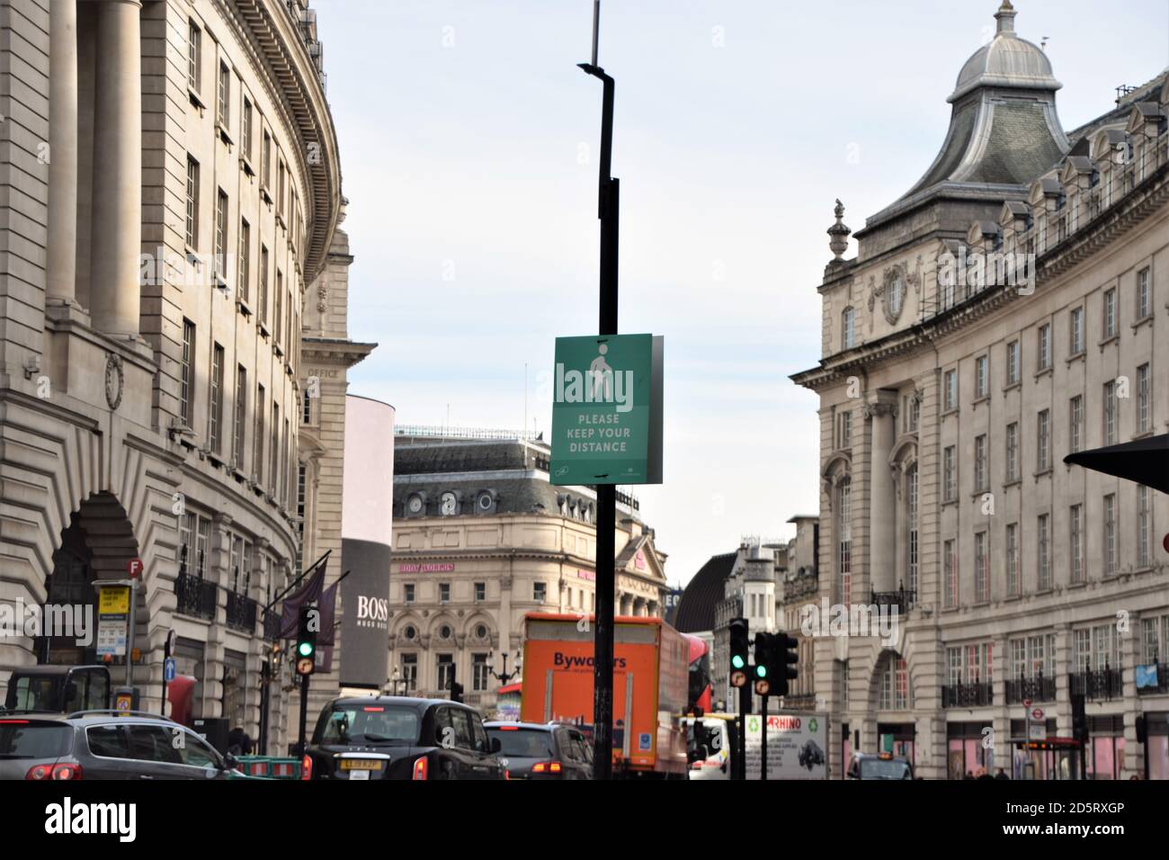 Social Distancing sign on Regent Street, London, UK Stock Photo - Alamy