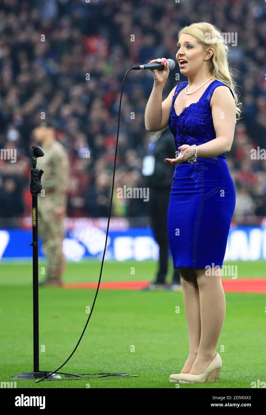Emily Haig sing the national anthem ahead of the EFL Cup Final match ...