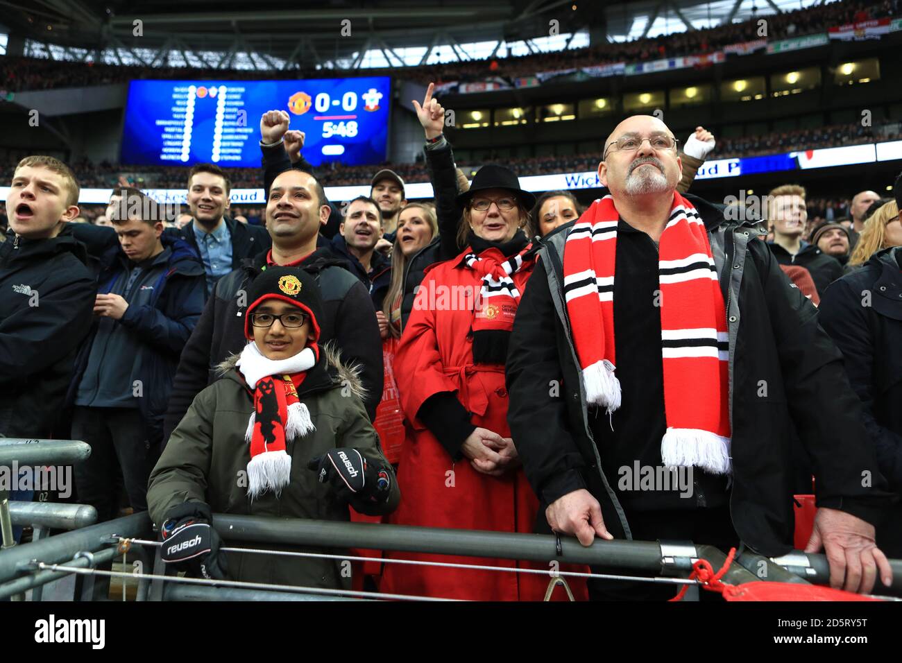 Manchester United supporters in the stands at Wembley Stock Photo - Alamy