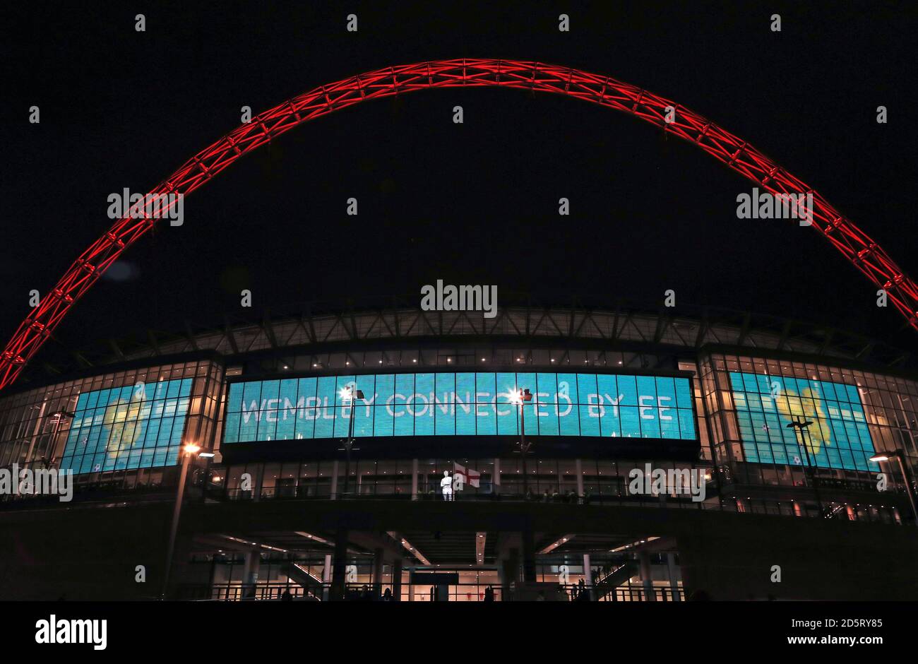 A general view as EE branding is shown on the large screen after the ...