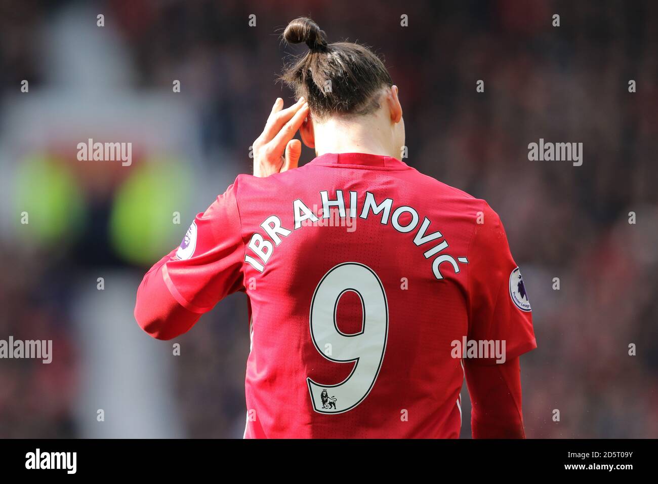 Manchester United's Zlatan Ibrahimovic holds the back of his head after ...